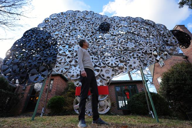 Baltimore cyclist finds joy in collecting lost hubcaps and stringing ...