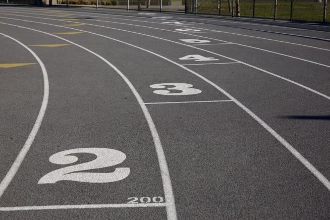 Suspect Charged With Murder in Fatal Track Meet Stabbing